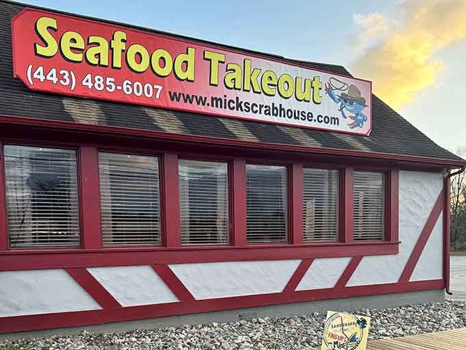 That cheerful crab mascot on the sign knows exactly what treasures await behind those red-trimmed windows.