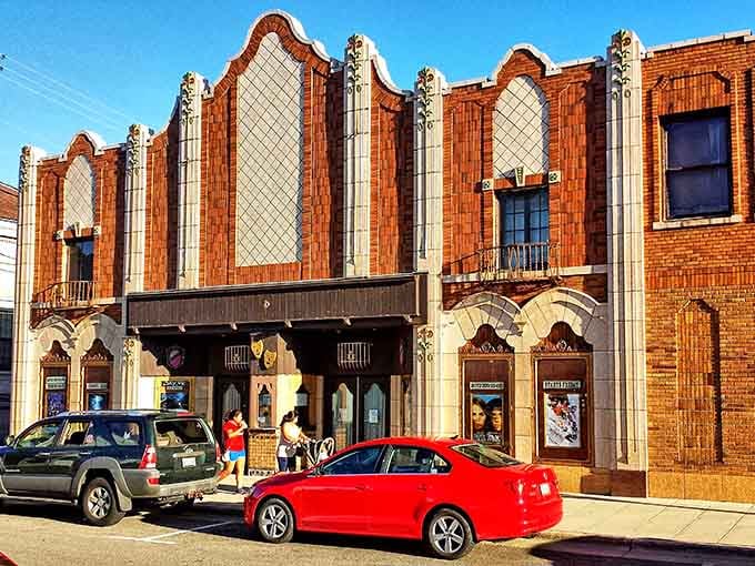 Art Deco details dance across this theater's brick facade like a love letter to the Jazz Age written in terracotta.