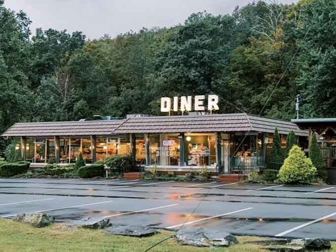 When that giant "DINER" sign glows at dusk, you know you've found the Catskills' favorite breakfast-all-day destination tucked among the trees.