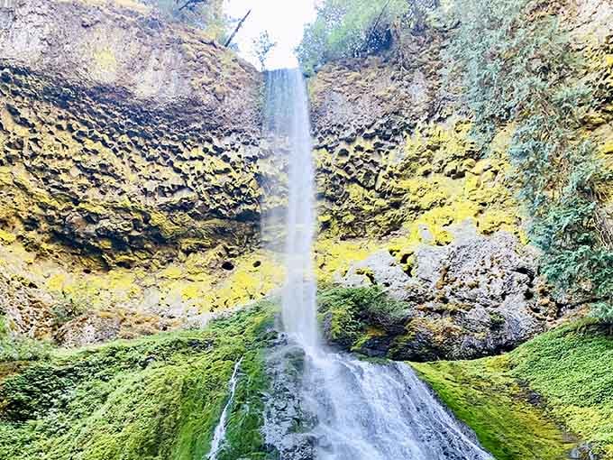 This tiered beauty tumbles down like nature's own grand staircase, each level more photogenic than the last.