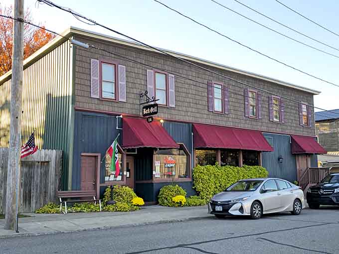 This historic building wears its burgundy awnings like a badge of honor in charming small-town America.