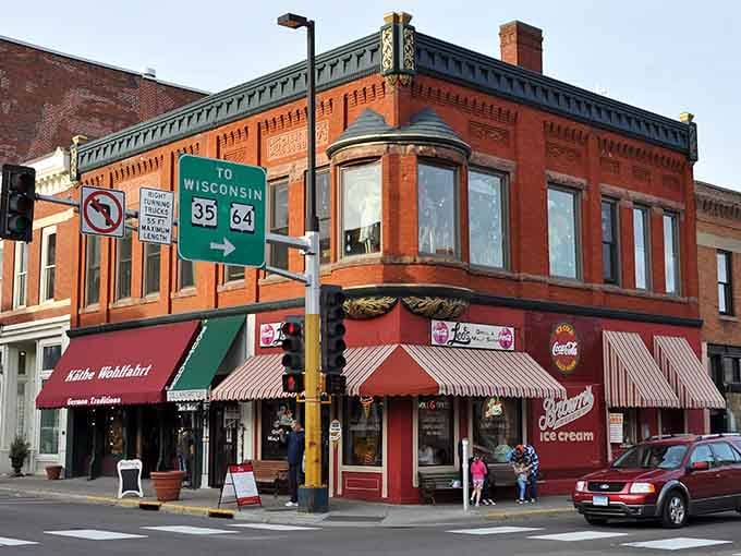 The corner building's windows catch the light perfectly, an architectural detail that modern construction forgot.