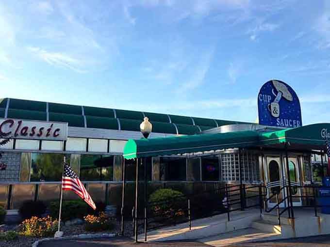 Chrome and curves gleam under blue skies at this classic diner that looks like it rolled straight from Happy Days.