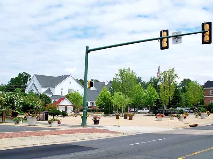 Wide open spaces and flower planters show a town that takes pride in creating welcoming gathering spots for everyone.