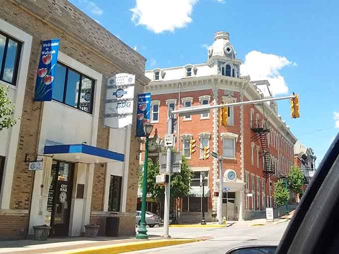 That ornate cupola catches the sunlight like a beacon welcoming you to a place where neighbors still wave.