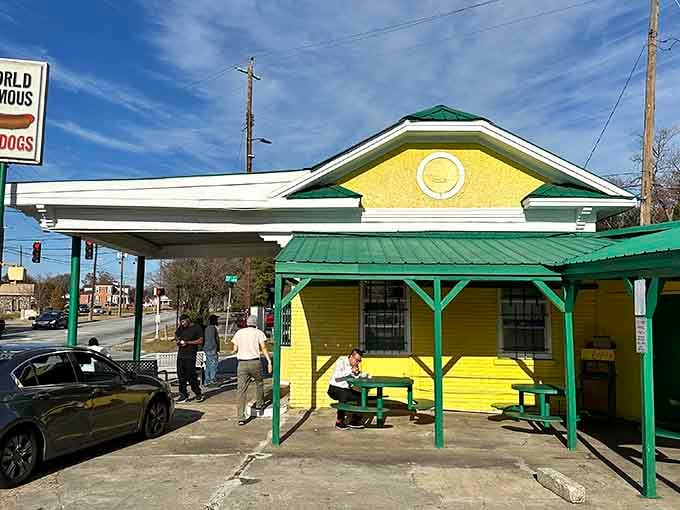Sunshine yellow walls practically glow with happiness, inviting you to discover what makes these hot dogs truly world famous.