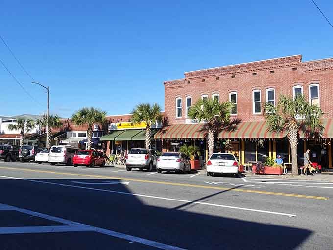 Palm trees and brick facades blend beautifully in Apalachicola's charming downtown district, where history lives on every corner.