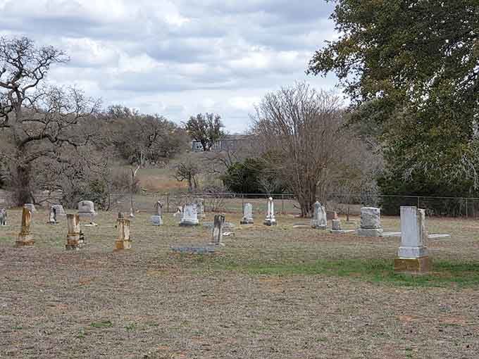 This bare landscape reveals the simple beauty of these pioneer graves resting beneath dramatic clouds and endless Texas sky.