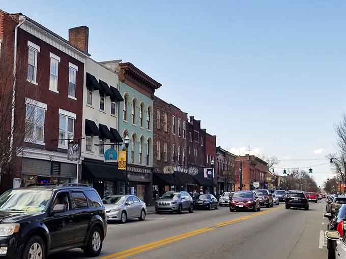 Brick buildings in warm earth tones line up like old friends sharing stories across the generations.