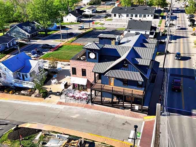 That building stands watch over streets where everyone still knows the crossing guard's first name and favorite pie.
