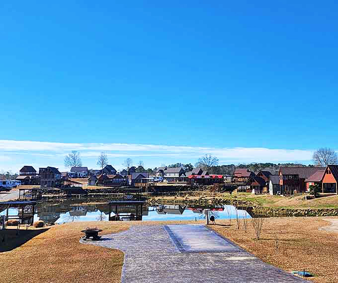 A peaceful boat launch beckons under brilliant blue skies, promising lazy afternoons on calm, reflective waters.