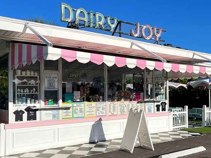 The retro neon sign glows with promise&mdash;Dairy Joy delivers exactly what the name suggests, one cone at a time.