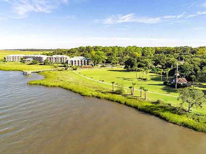 Waterfront living meets lush landscapes in this serene setting where marshes and trees create their own peaceful symphony.