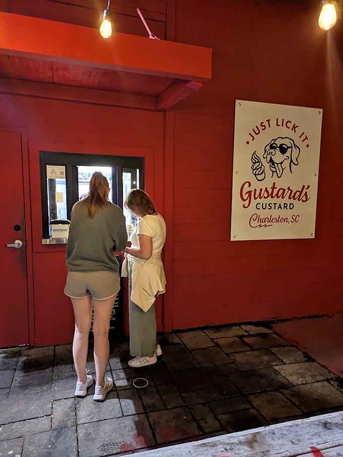Evening light catches customers at the window, capturing that timeless moment before pure ice cream bliss.