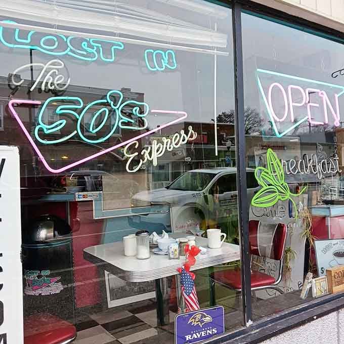 Those neon signs glowing in the window promise a time-traveling breakfast adventure worth taking.