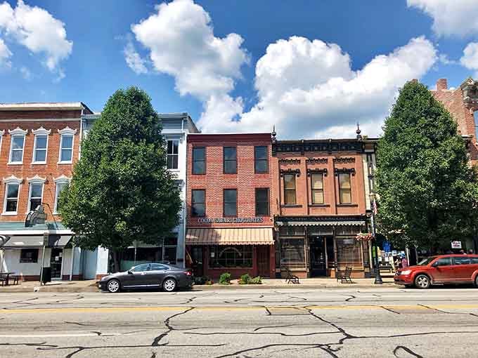 Those puffy clouds and historic facades create a postcard moment that Instagram wishes it could capture.