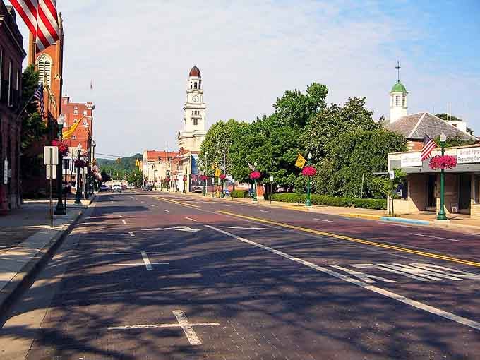 Those twin clock towers frame the street like bookends holding together chapters of small-town American life perfectly preserved.