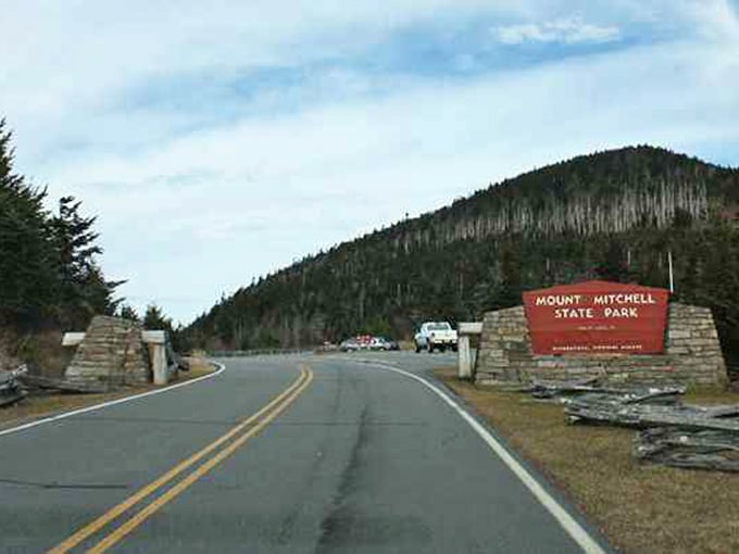 That classic park sign means you've arrived where the air gets crisp and the views get ridiculous&mdash;in the best way.