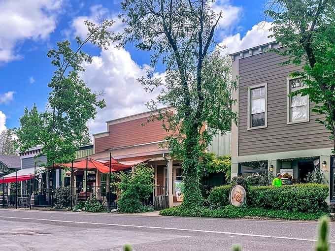 Red awnings and outdoor seating invite you to linger over coffee while the world rushes by somewhere far away.