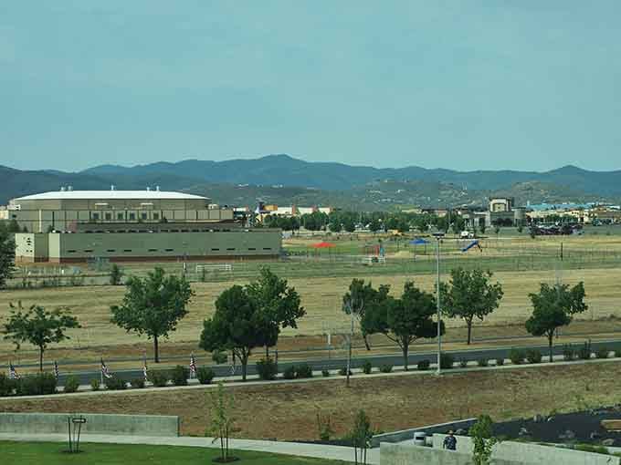 Young trees line the streets of this growing community, where mountain views come standard with every home.