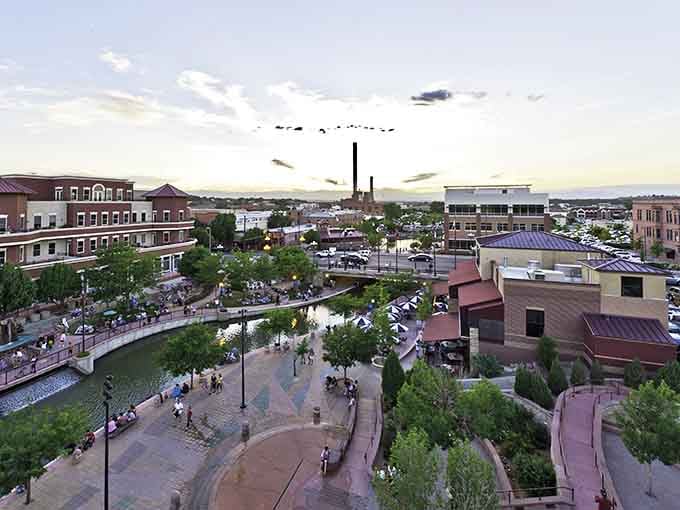 Evening light bathes the Riverwalk area where locals gather to stroll, dine, and enjoy Colorado's famous 300 days of sunshine.