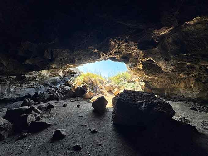 Standing at the threshold where desert meets darkness, you can almost feel the ancient volcanic energy.
