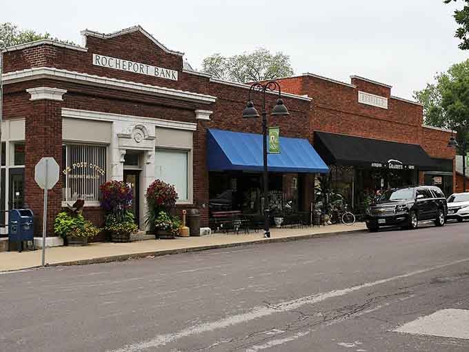 The old bank building stands proud with flower baskets blooming, proving historic doesn't mean stuck in the past.