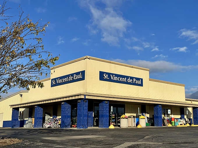 Blue pillars gleaming under sunny skies, this spacious location makes donating and discovering equally convenient for everyone.