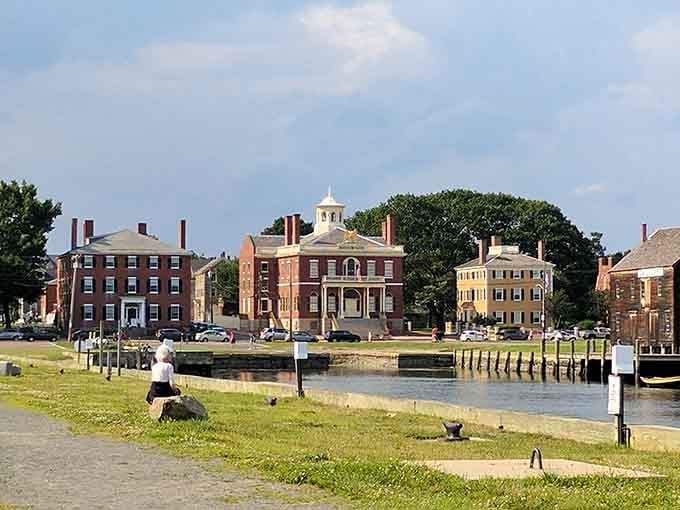 Stately brick mansions line the waterfront like proud sea captains watching over the harbor they once ruled with commerce.
