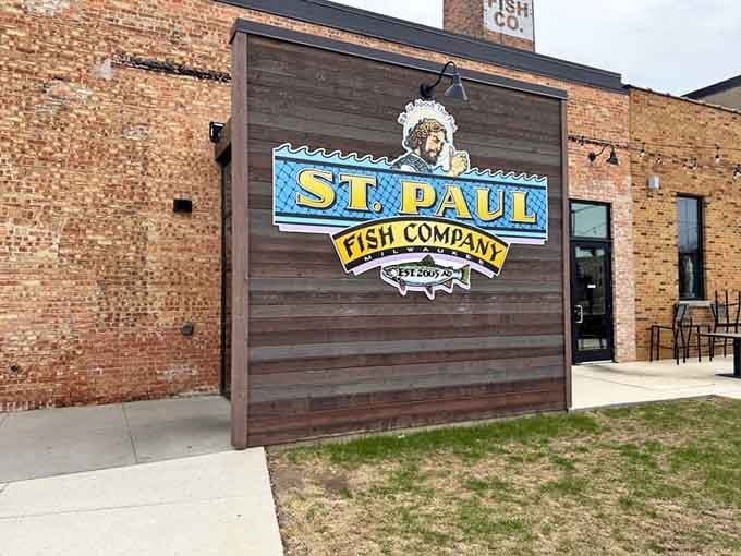 The vintage signage and weathered brick whisper stories of generations who've gathered here for exceptional fish and chips.