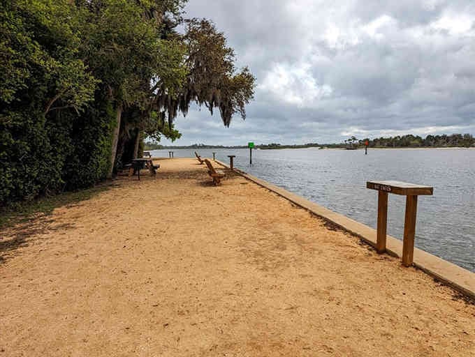 Relax along the peaceful waterfront where shaded benches and scenic views offer a perfect spot for quiet reflection and nature.