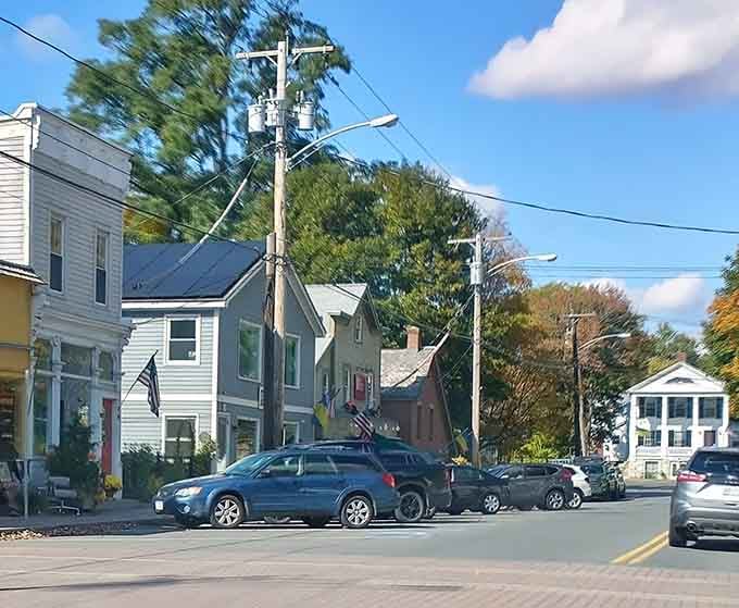 Colorful homes line streets where neighbors still wave and nobody honks when you're slow at green lights.