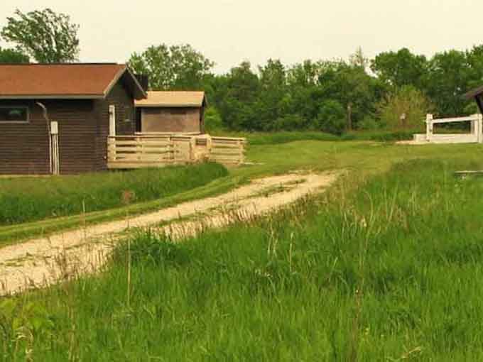 Green grass and winding paths lead to peaceful spots where the only agenda is watching clouds drift by overhead.