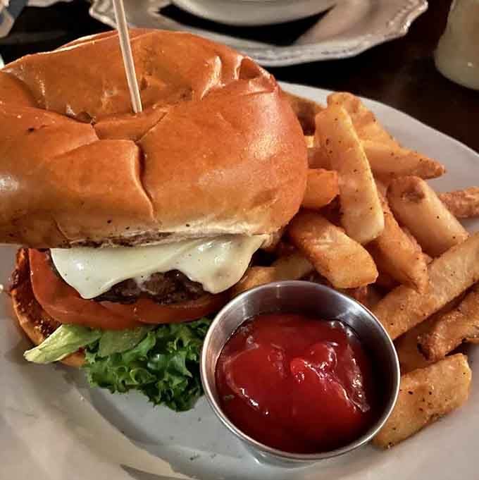 That burger knows exactly what it's doing with melted cheese and perfectly seasoned fries as backup dancers.