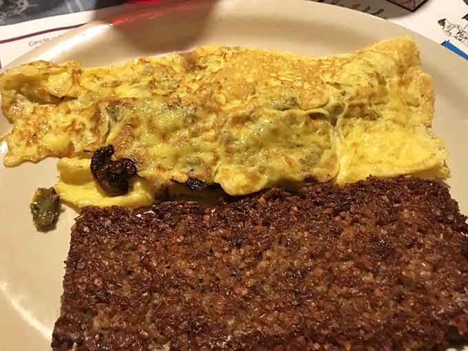 That fluffy omelet paired with crispy goetta proves regional specialties can absolutely steal the show at breakfast time.