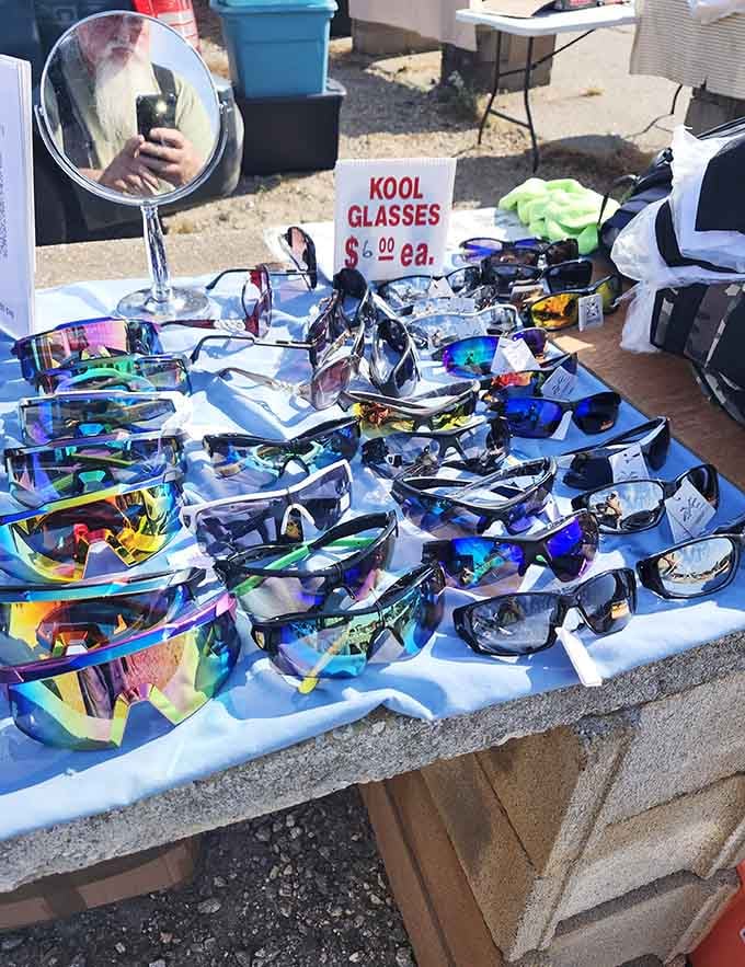 Kool glasses spread across the table like a rainbow exploded, ready to make everyone look mysteriously cool or hilariously retro.