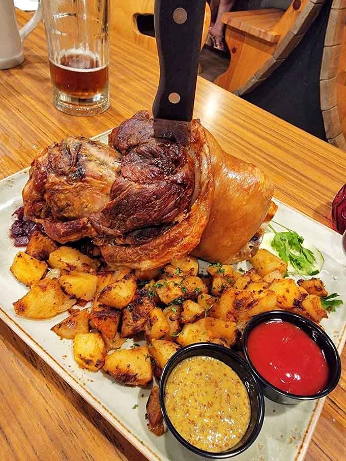 That pork shank standing tall with a knife through it looks like something Henry VIII would've wrestled over.