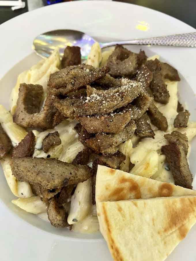 Four cheeses meeting gyro meat over pasta is the kind of summit meeting that actually solves problems, delicious problems.