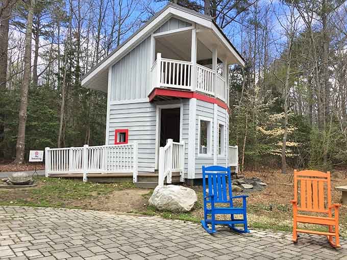 This whimsical tiny house is basically every HGTV dream compressed into one adorable, colorful woodland package.