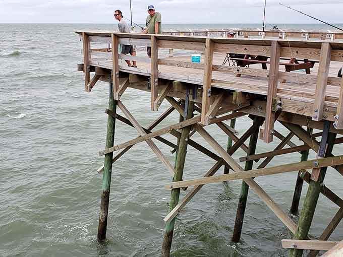 Where patience meets the ocean, and every cast holds the promise of tonight's dinner story.