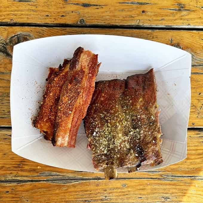 That bark on those ribs and brisket tells you everything you need to know about patience and smoke.