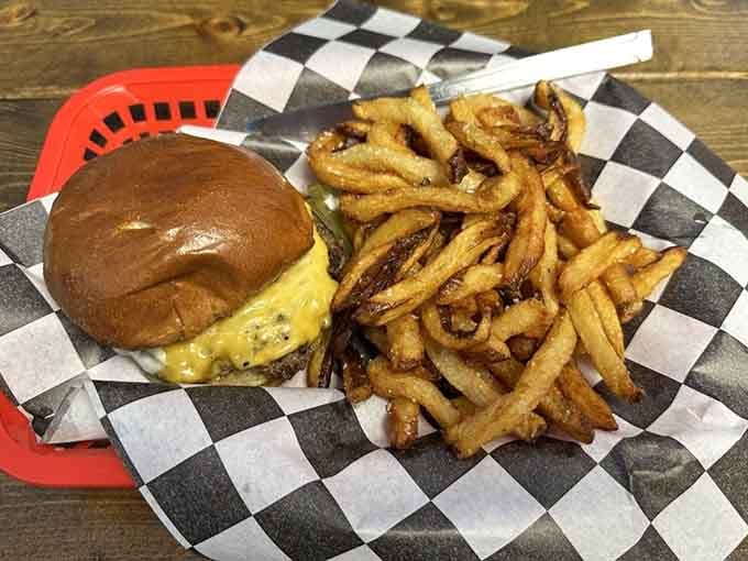 A perfectly golden cheeseburger with crispy fries proves that sometimes the classics need no introduction or apology.