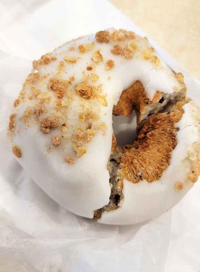 This blueberry crumble donut proves that fruit counts as breakfast, especially when buried under this much glaze.