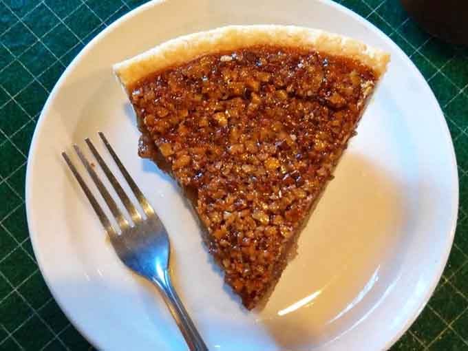 Pecan pie with that perfect caramel filling proves some traditions exist because they simply can't be improved upon.