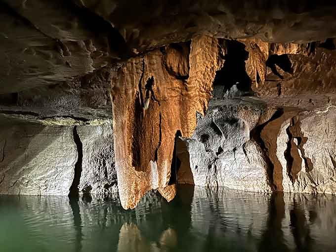 Stalactites hang like nature's chandeliers, proving Mother Earth has better interior design skills than most of us.
