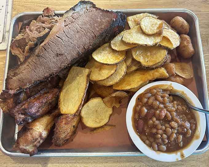 When your platter includes brisket, ribs, pulled pork, and chips, you've basically won the barbecue lottery without buying a ticket.