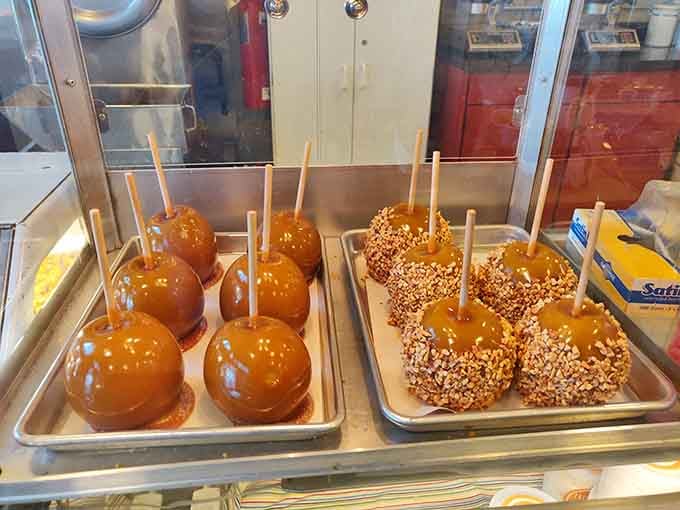 Plain caramel apples on the left, fancy dressed-up ones on the right, because some apples like to party.