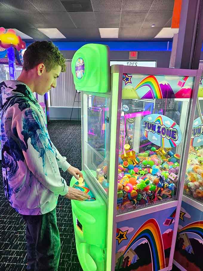 Watching someone master the claw game is like witnessing a surgical procedure, except the patient is a stuffed unicorn.