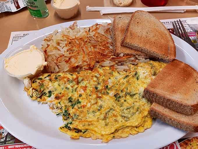 When your omelet arrives with hash browns and toast, you'll understand why portion control never caught on here.