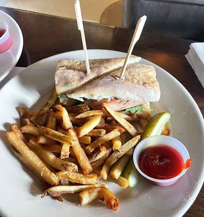 That golden-crusted sandwich paired with crispy fries proves simple done right beats fancy done wrong every single time.